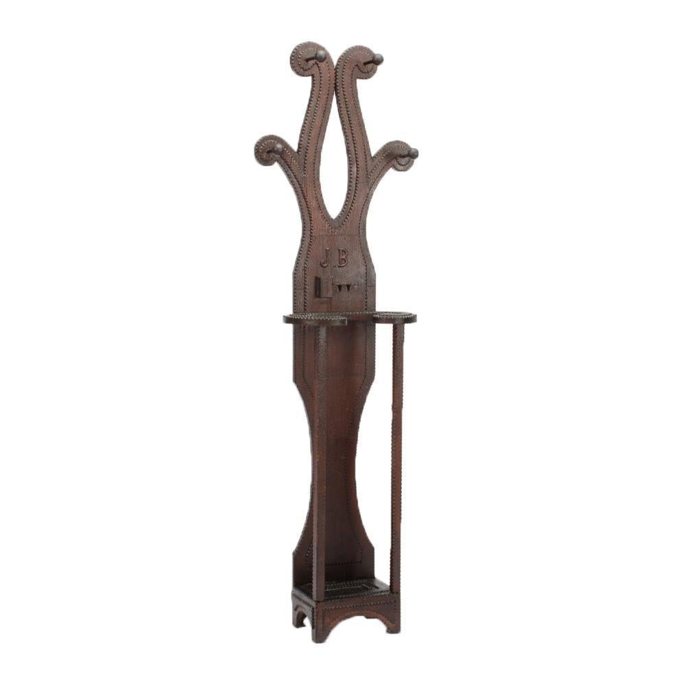A monogrammed 19th century Tramp Art hall tree with pipe holder. For ...