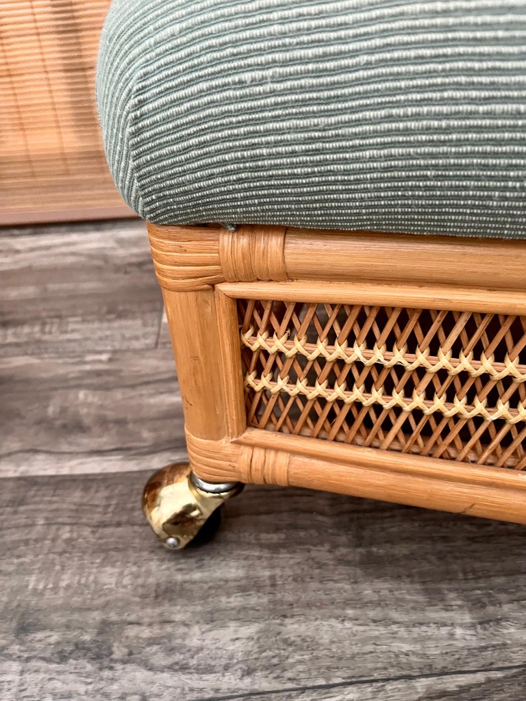 Pair of 1980s Coastal Style Upholstered Rattan Foot Stools with Casters ...