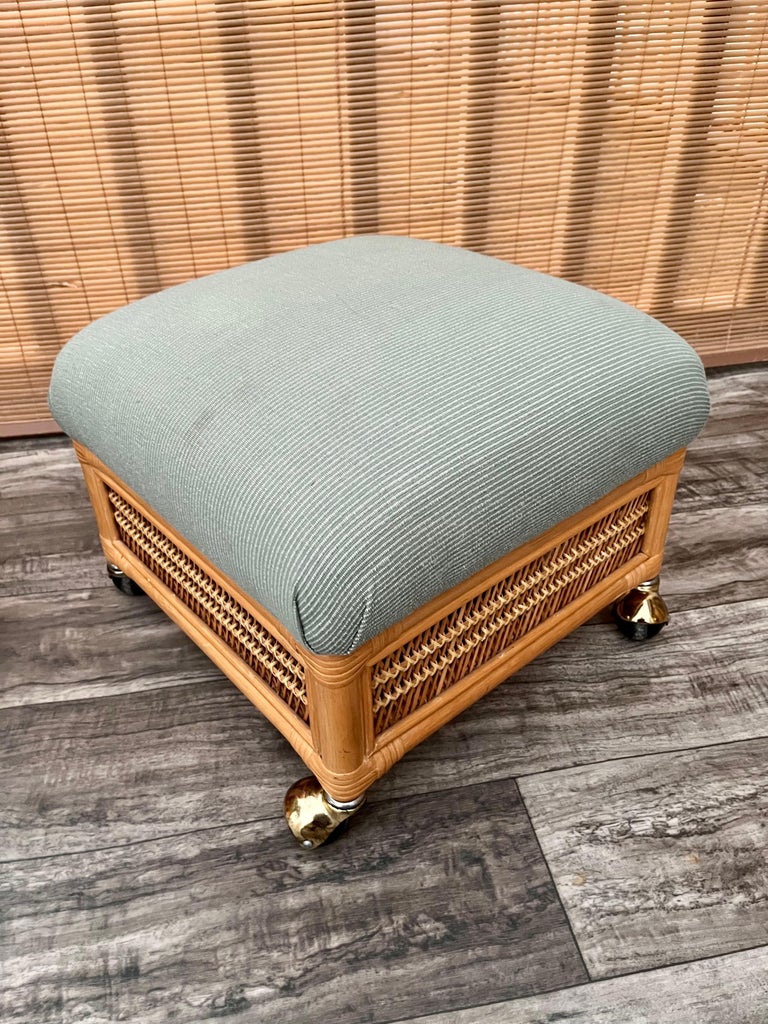 Pair of 1980s Coastal Style Upholstered Rattan Foot Stools with Casters ...