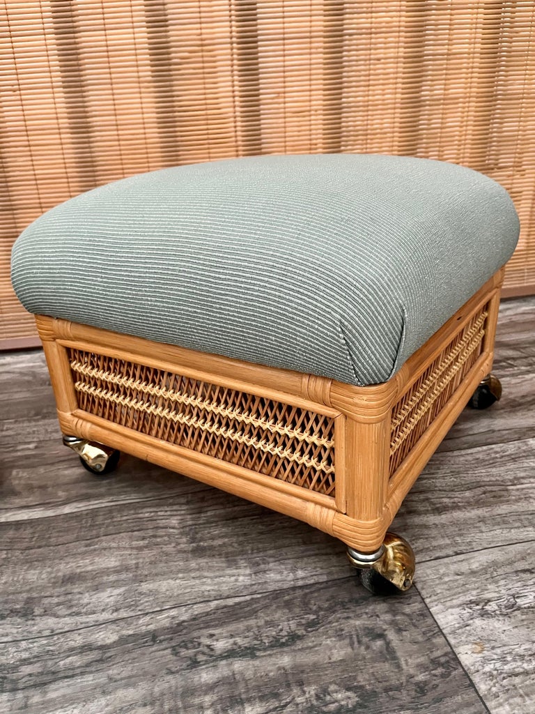 Pair of 1980s Coastal Style Upholstered Rattan Foot Stools with Casters ...