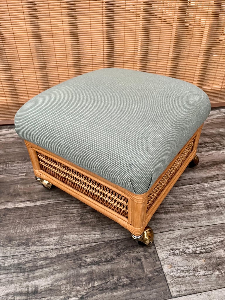 Pair of 1980s Coastal Style Upholstered Rattan Foot Stools with Casters ...