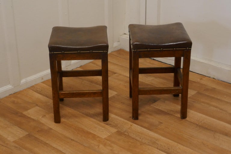 Pair of Arts and Crafts Golden Oak and Leather Stools For Sale at 1stDibs