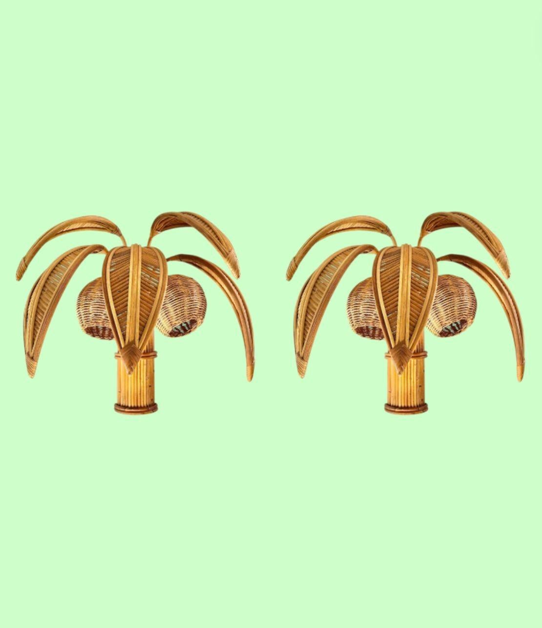 A pair of bamboo and rattan palm tree wall lights with two coconut ...