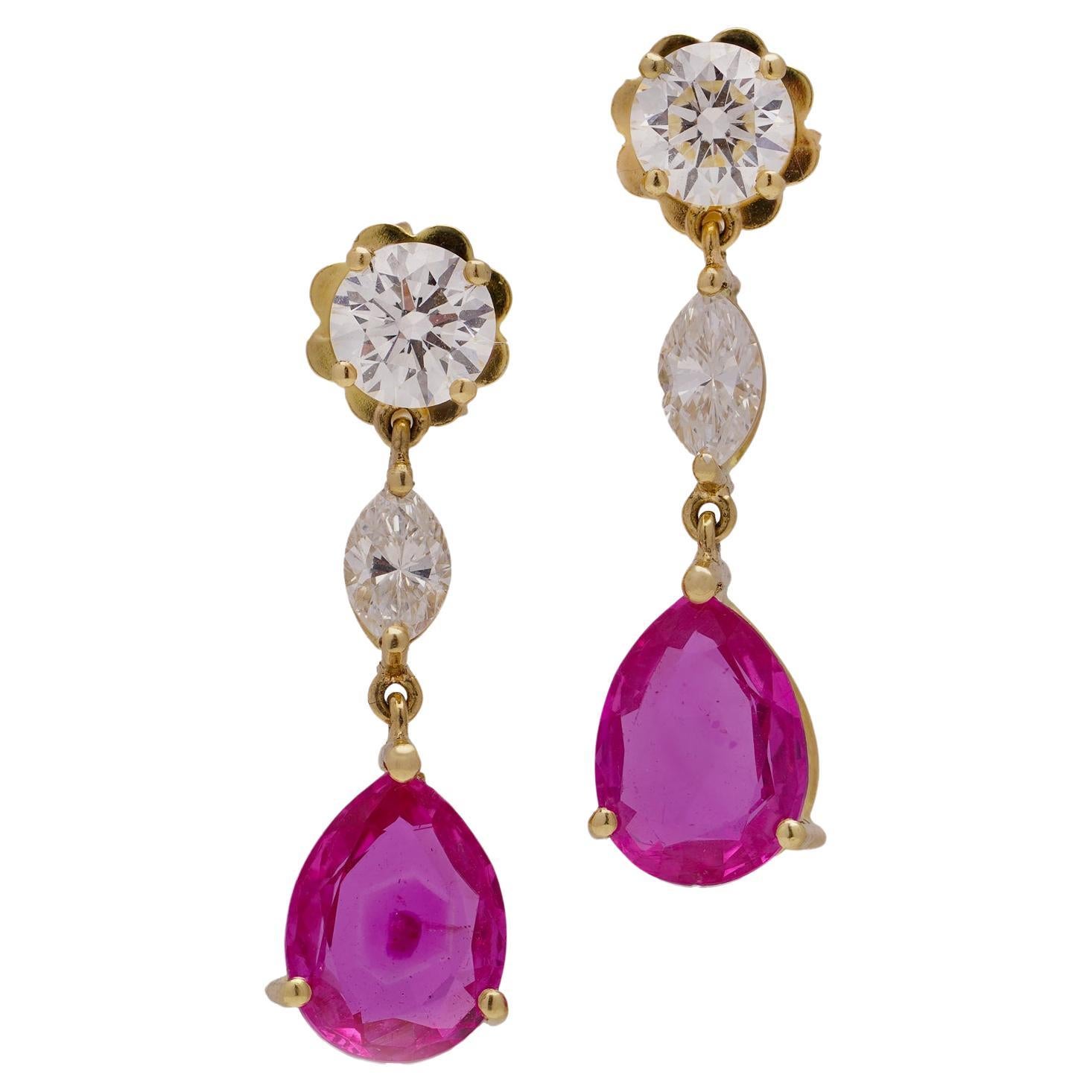 A pair of Burma no heat ruby and diamond drop earrings in 18kt yellow ...