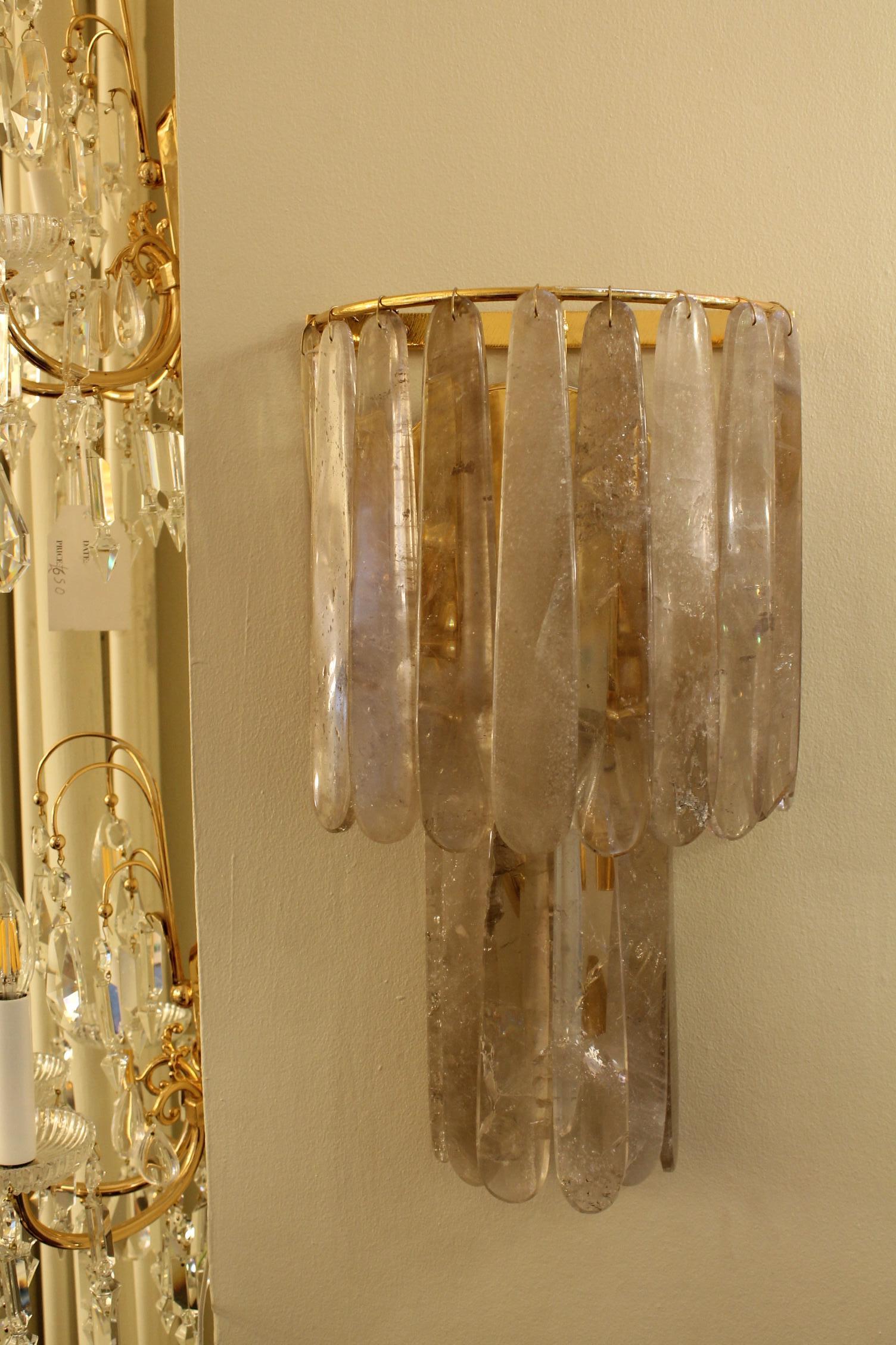A pair of classic two tier rock crystal wall lights For Sale at 1stDibs