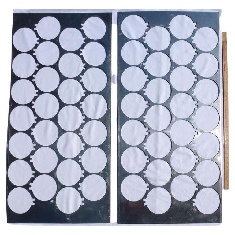 A pair of decorative industrial metal panels with strong graphic look ...