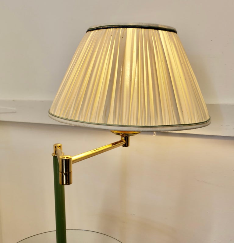 A Pair of French Art Deco Adjustable Swing Arm Floor Lamps, reading ...
