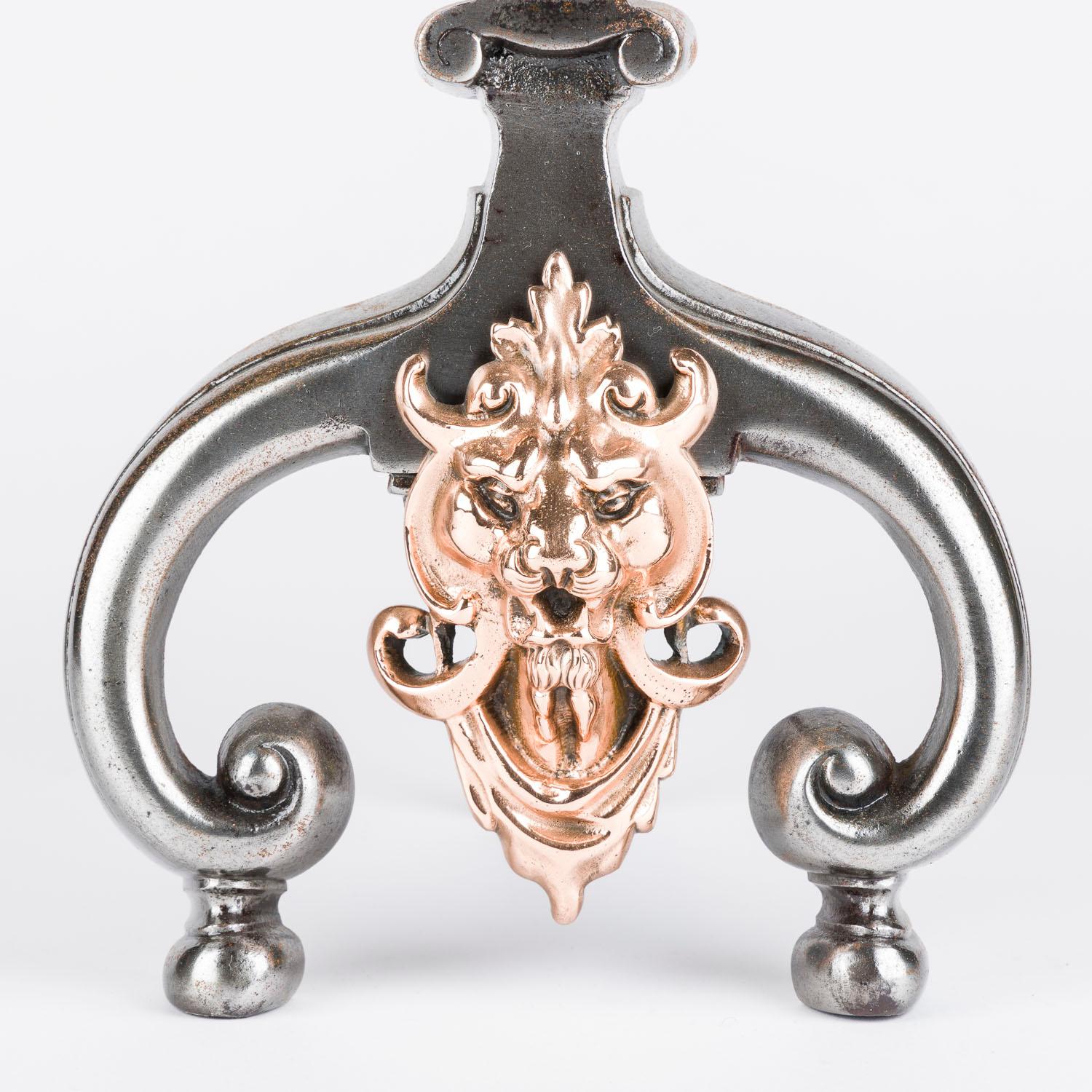 A pair of French ornate copper and steel andirons For Sale at 1stDibs