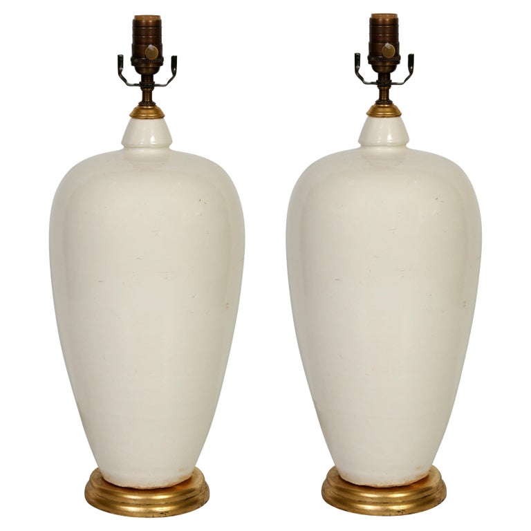 Pair of White Ceramic Lamps with Gold Base For Sale at 1stDibs