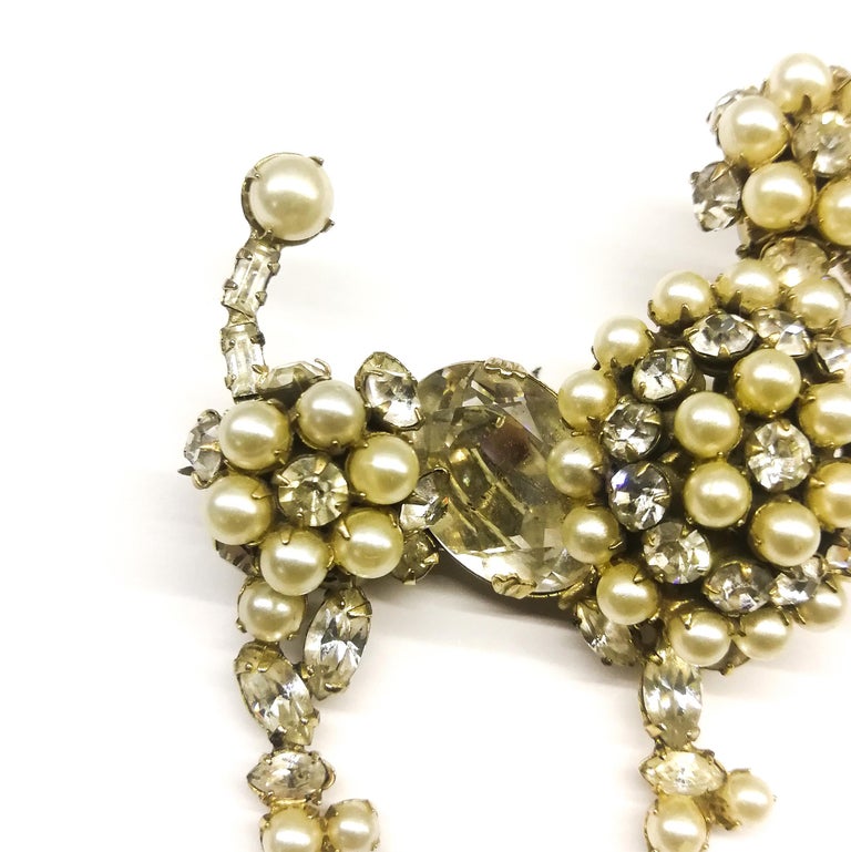 A paste pearl and clear paste 'poodle' brooch, Schreiner, USA, 1960s ...