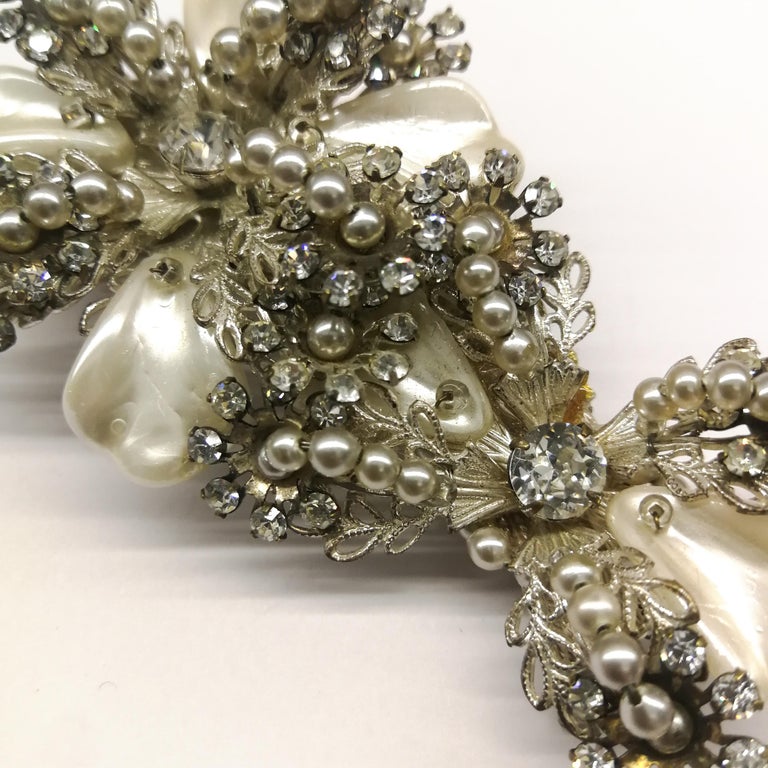 A pearlised glass 'leaf' and paste 'spray' brooch, Miriam Haskell, USA ...