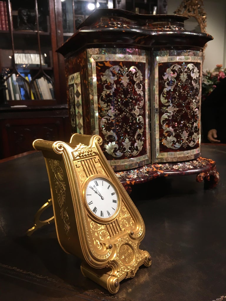 Rare and Unusual Bronze Lyre-Shaped Strut Clock Designed by Thomas Cole ...