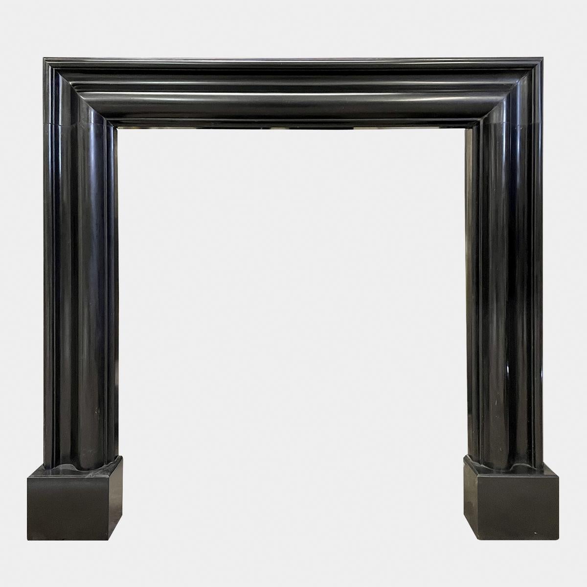 A Reclaimed Black Stone Bolection Fireplace Mantel For Sale at 1stDibs