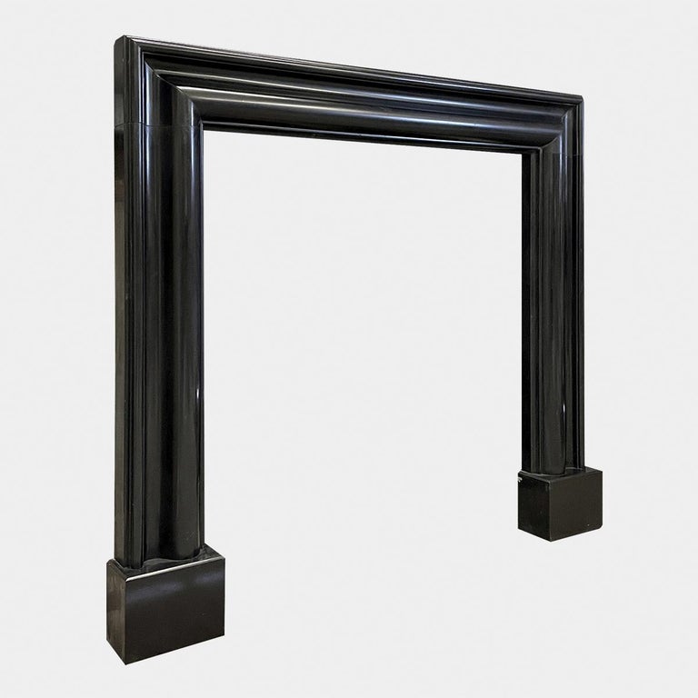 A Reclaimed Black Stone Bolection Fireplace Mantel For Sale at 1stDibs