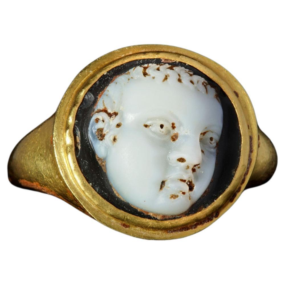 A Roman Gold Ring With A Three Quarters Portrait Of A Child 1st/2nd ...