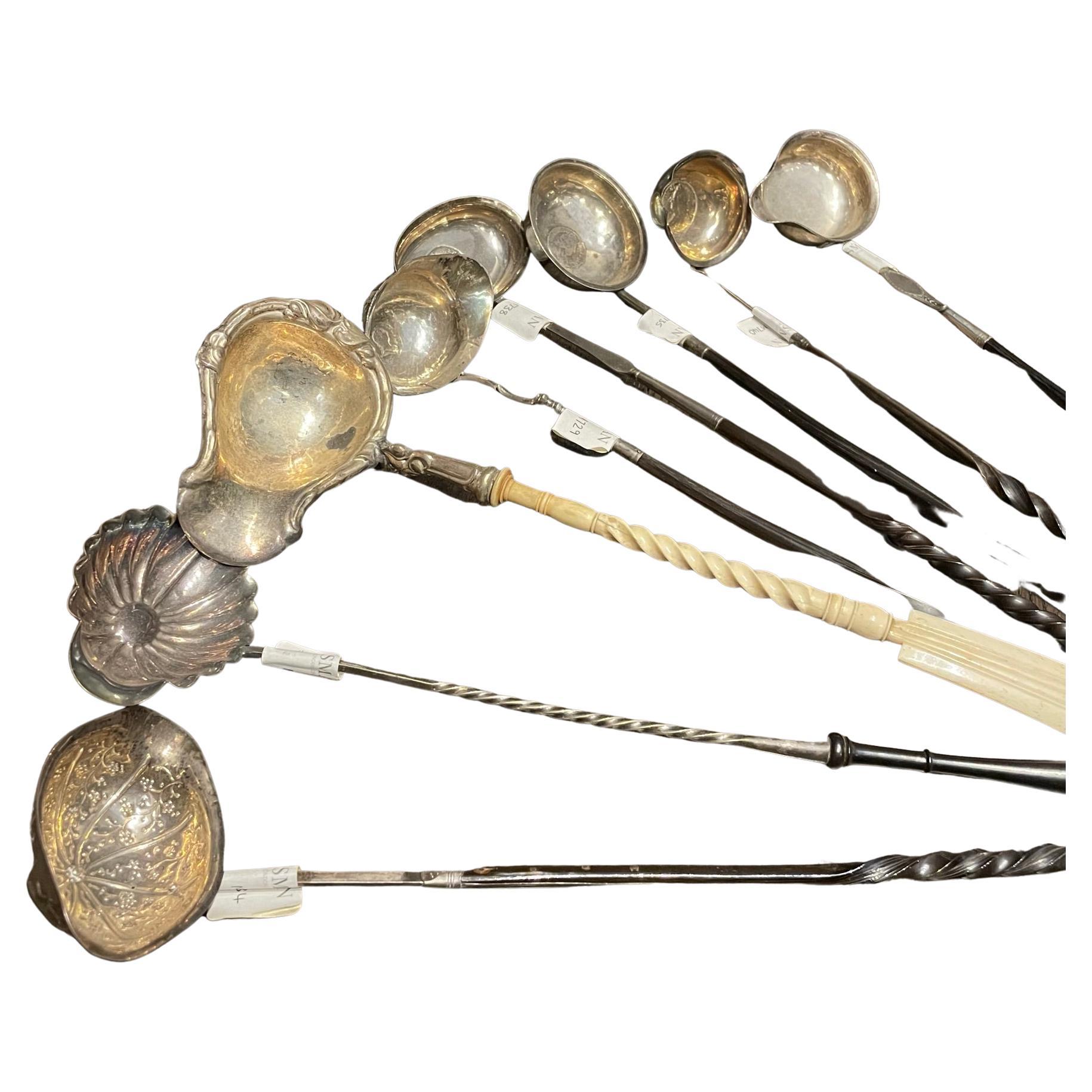 A Set of Eight silver 18th Century Toddy Ladles For Sale at 1stDibs