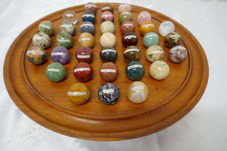 Set of French Marble Orbs on a Turned Solitaire Board at 1stDibs