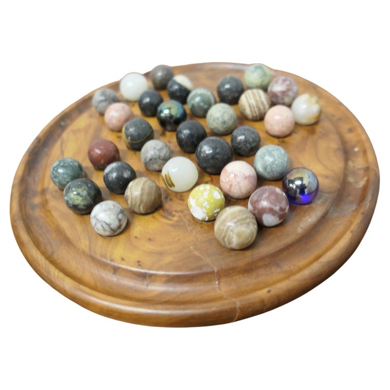 Set of French Marbles on a Turned Solitaire Board For Sale at 1stDibs