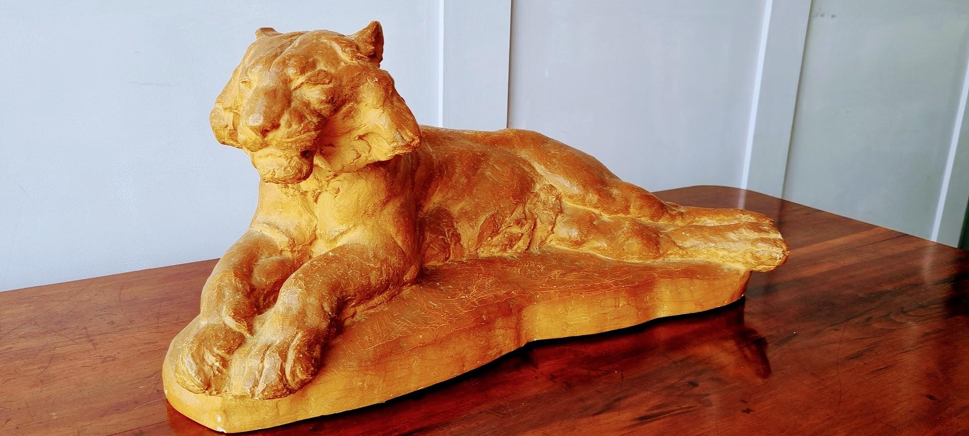 A signed large terracotta sculpture of a lioness by Richard Fath. For ...