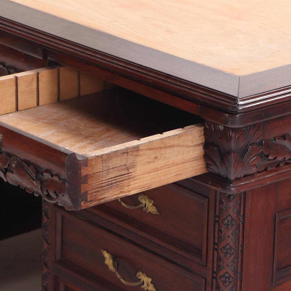 A stately American Victorian carved mahogany three-part pedestal ...