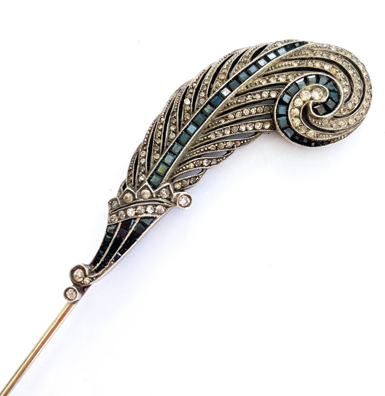 A striking silver and clear and coloured paste Art Deco jabot pin ...