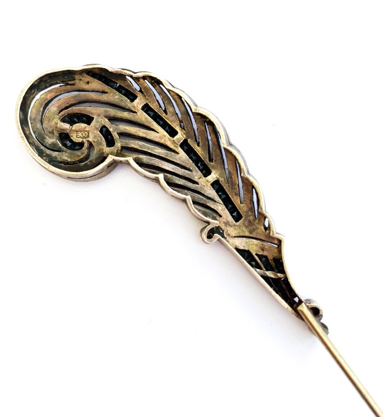 A striking silver and clear and coloured paste Art Deco jabot pin ...