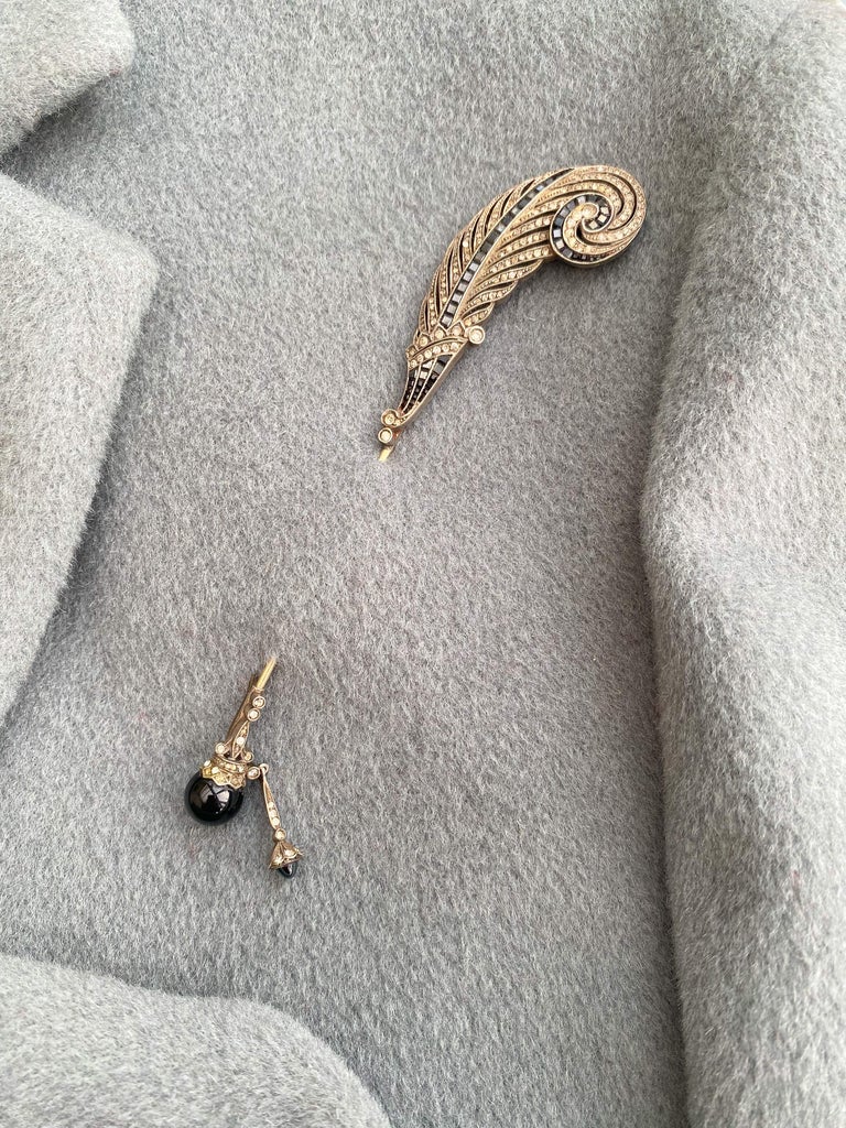 A striking silver and clear and coloured paste Art Deco jabot pin ...