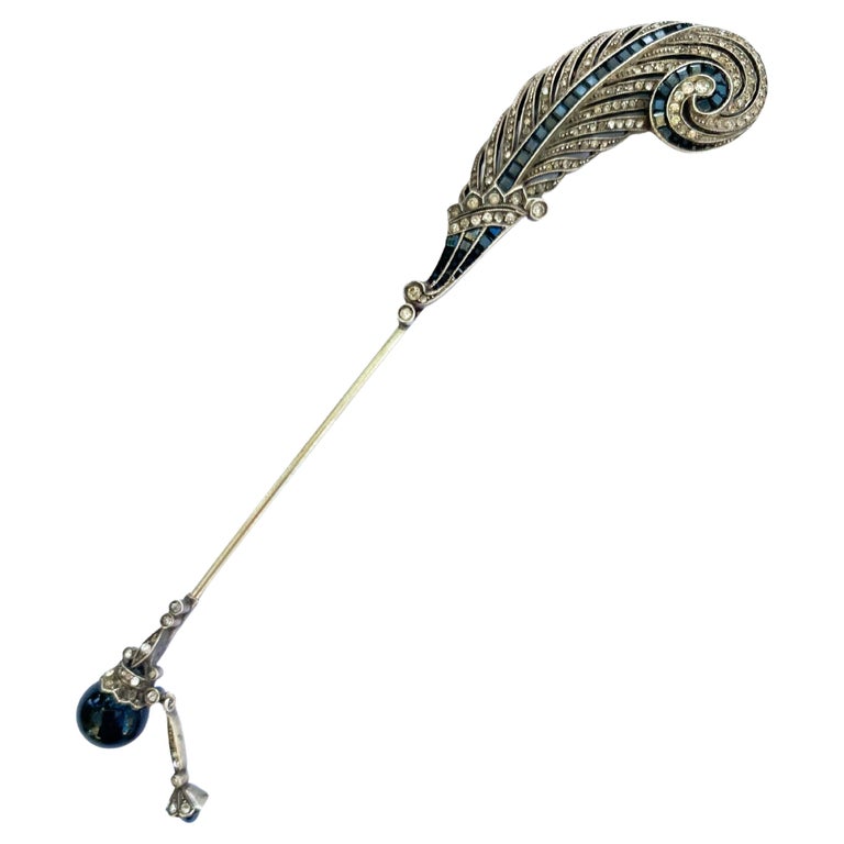 A striking silver and clear and coloured paste Art Deco jabot pin ...