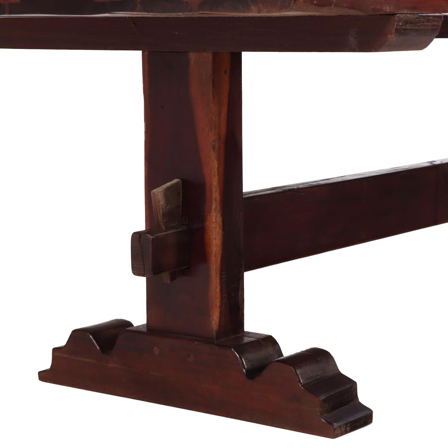 A Substantial Brazilian Trestle Table, C. 1920, made from a dense wood ...