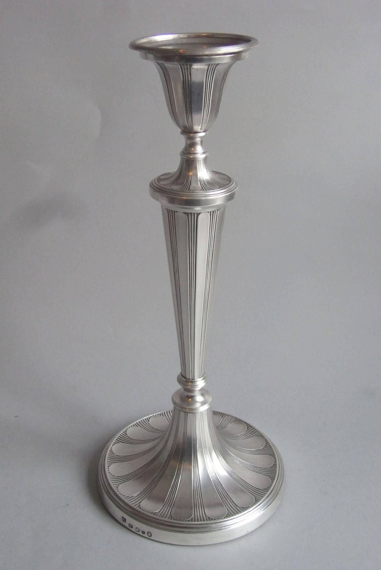 A Pair of George III Sterling Silver Candlesticks by Tudor and Leader ...