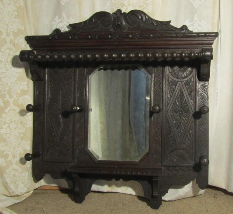 A Victorian Carved Oak Hall Mirror with Hat and Coat Hooks For Sale at ...