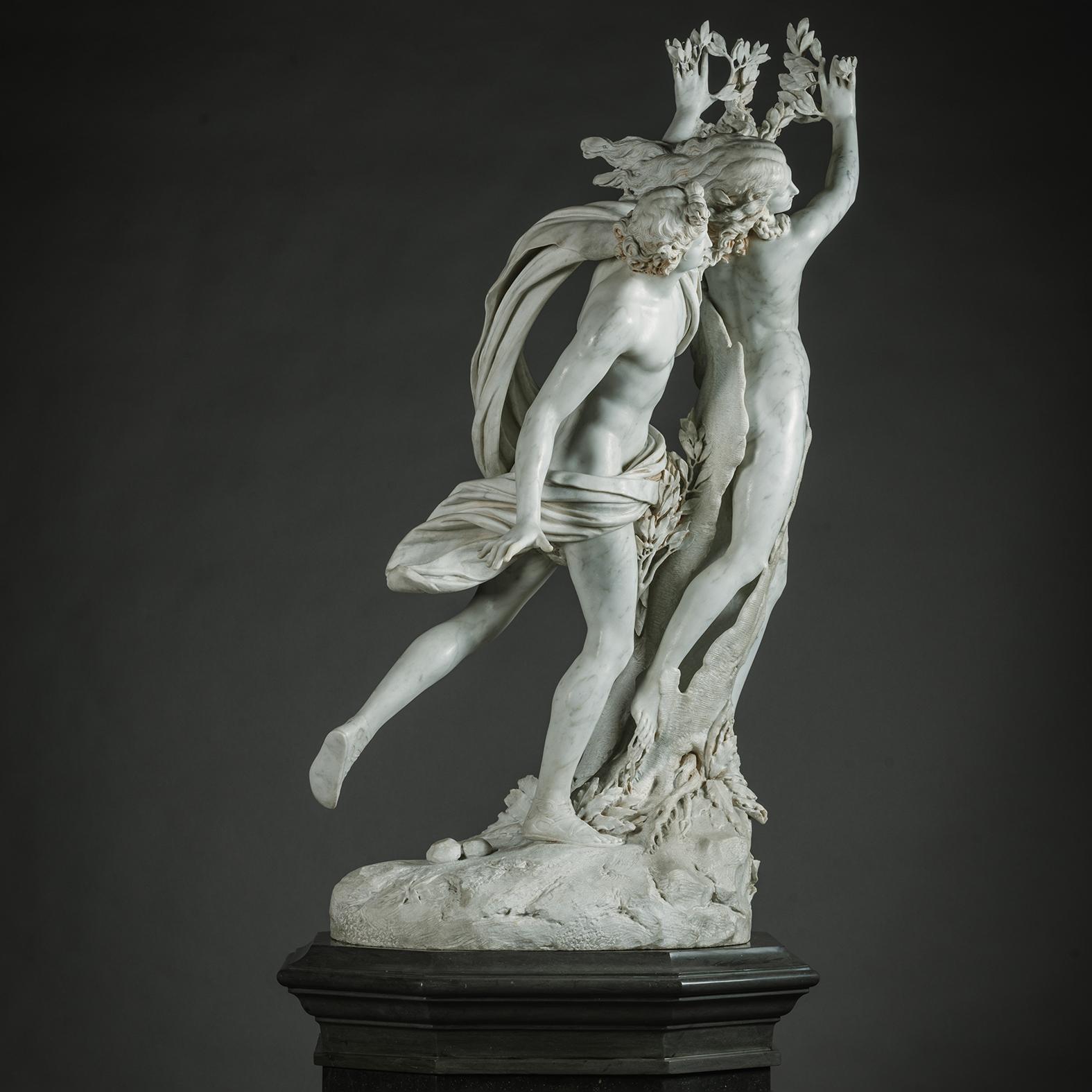 A White Statuary Marble Figural Group of Apollo and Daphne After ...