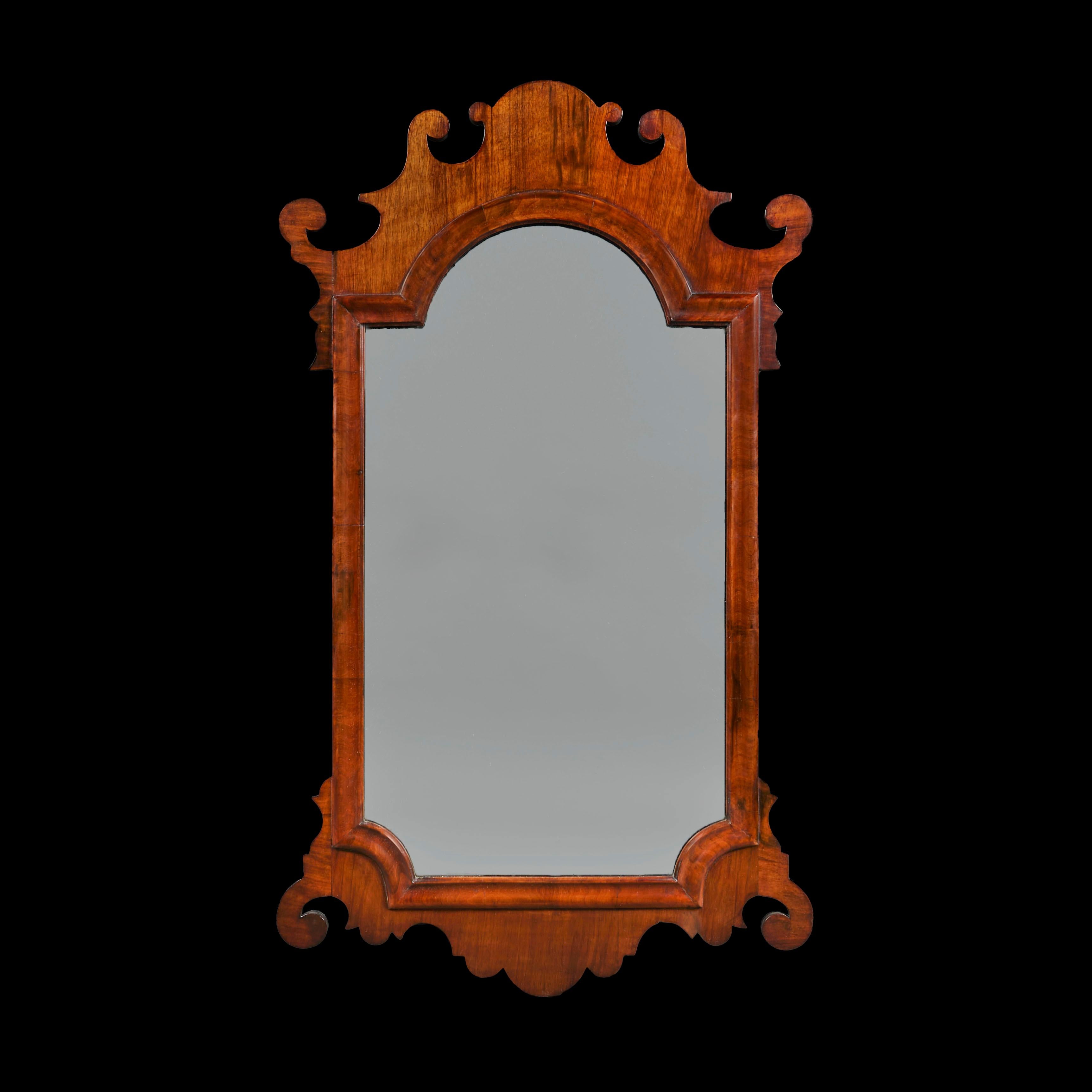 A Wooden Georgian Style Mirror With Scroll Cresting For Sale at 1stDibs