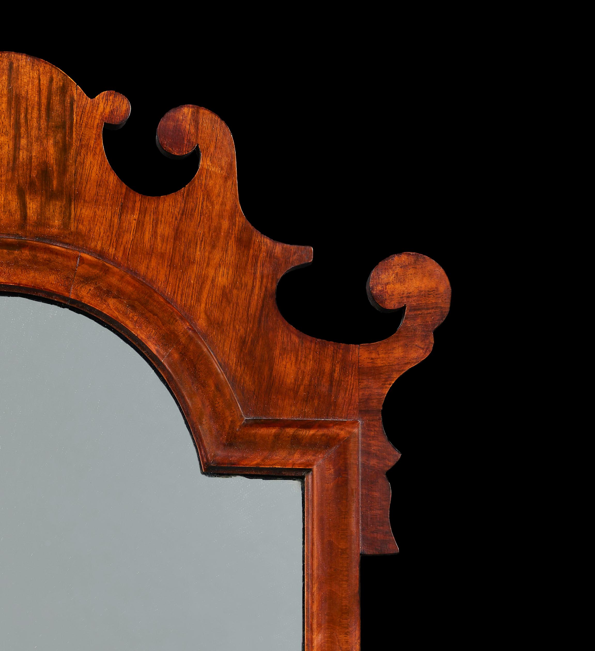 A Wooden Georgian Style Mirror With Scroll Cresting For Sale at 1stDibs