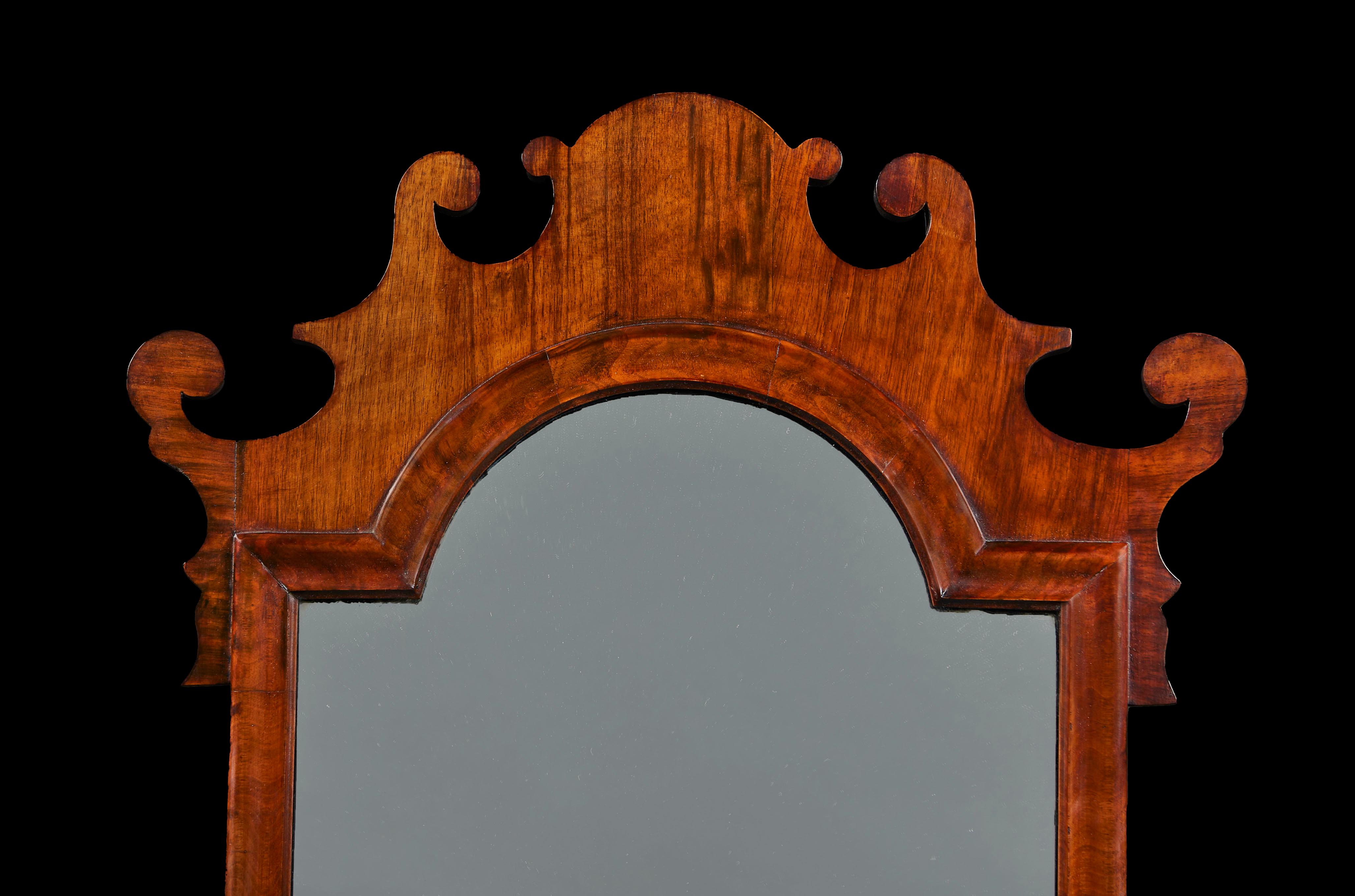 A Wooden Georgian Style Mirror With Scroll Cresting For Sale at 1stDibs