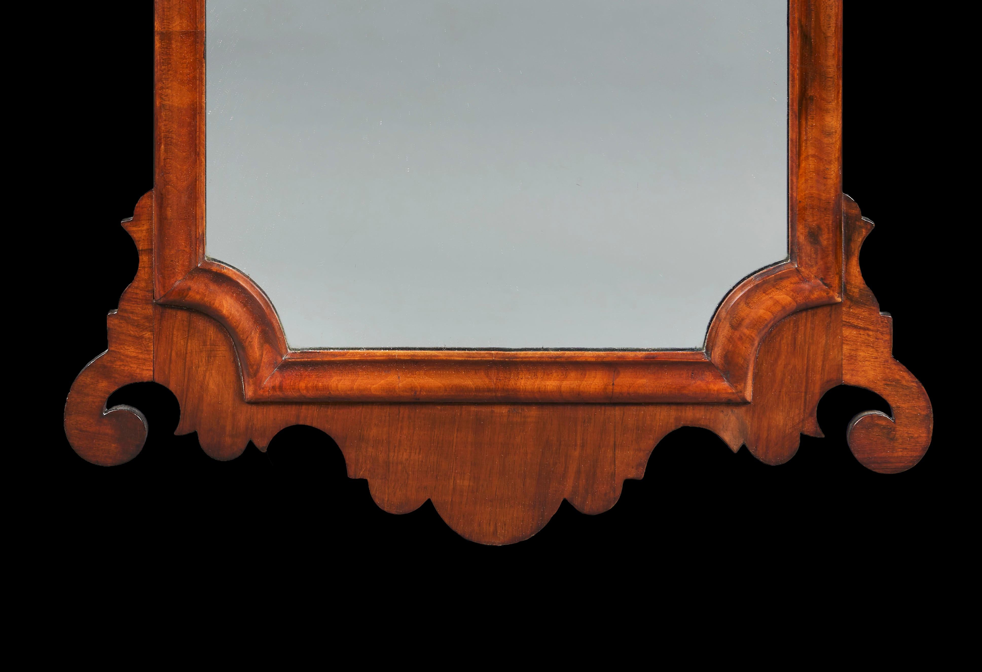 A Wooden Georgian Style Mirror With Scroll Cresting For Sale at 1stDibs
