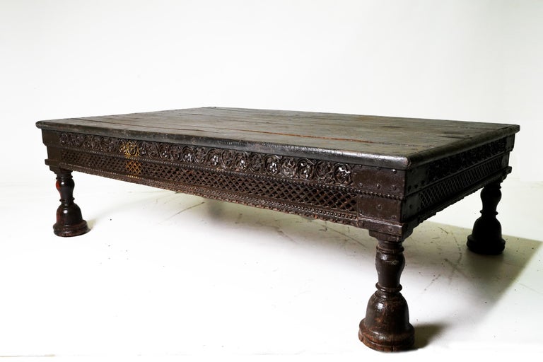 A Wooden Indian Daybed with Carved Decoration at 1stDibs