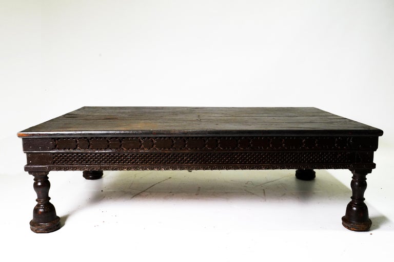 A Wooden Indian Daybed with Carved Decoration at 1stDibs