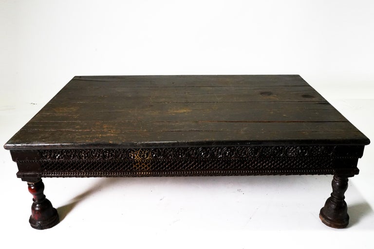 A Wooden Indian Daybed with Carved Decoration at 1stDibs