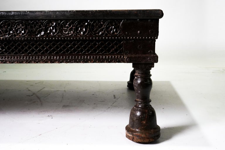 A Wooden Indian Daybed with Carved Decoration at 1stDibs