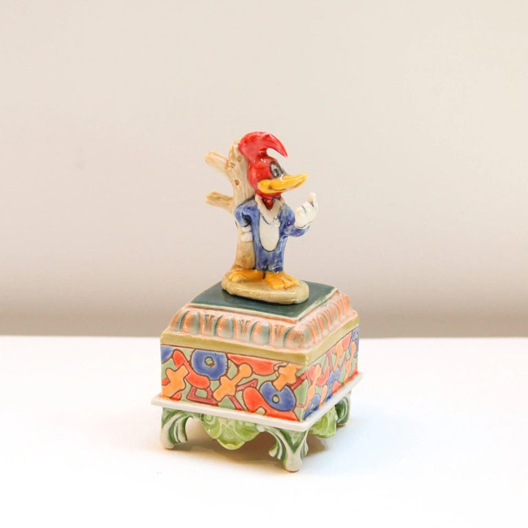 Ron Carlson - Ceramic Pop Art Woody on Plinth Sculpture For Sale at 1stDibs