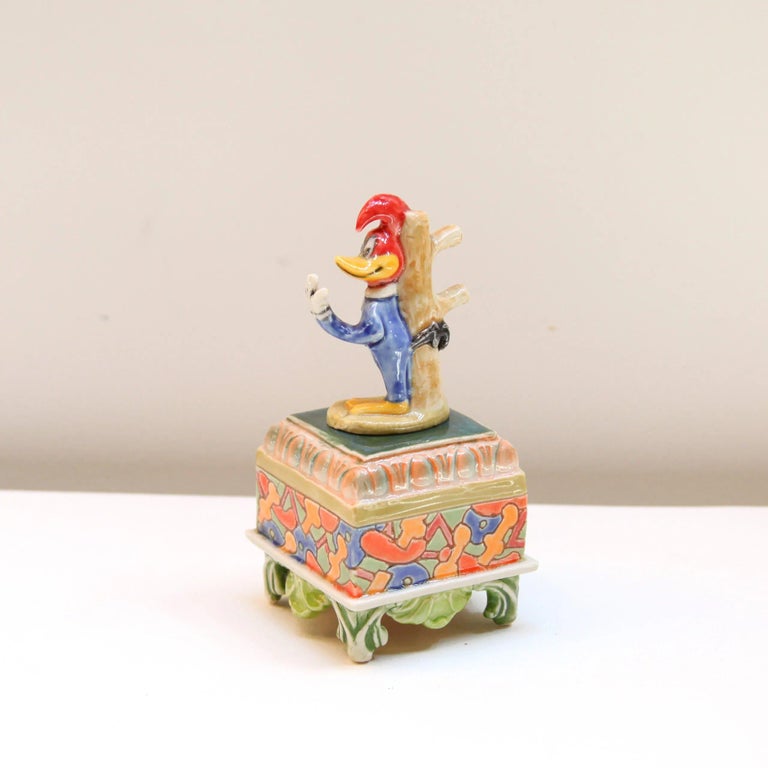 Ron Carlson - Ceramic Pop Art Woody on Plinth Sculpture For Sale at 1stDibs