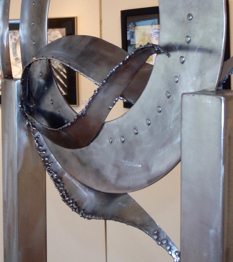 Janet Rutkowski - "Infinite Possibilities" welded steel wings swoop ...