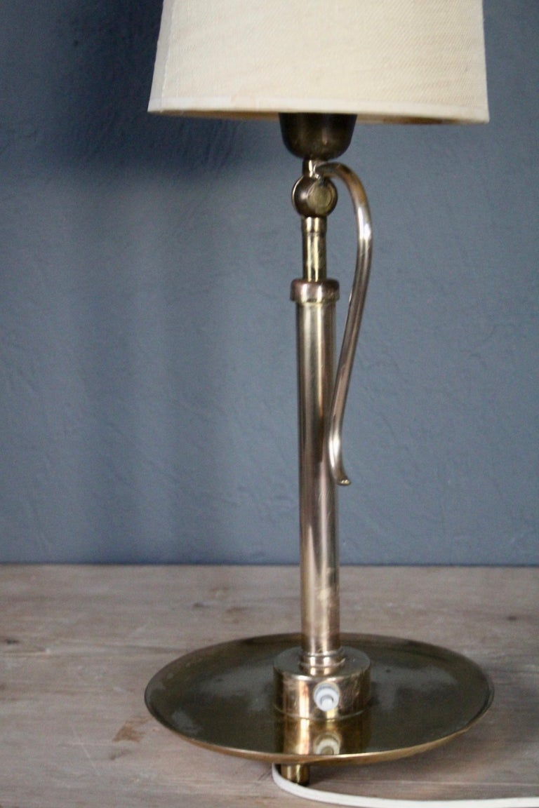 Adjustable brass table lamp For Sale at 1stDibs