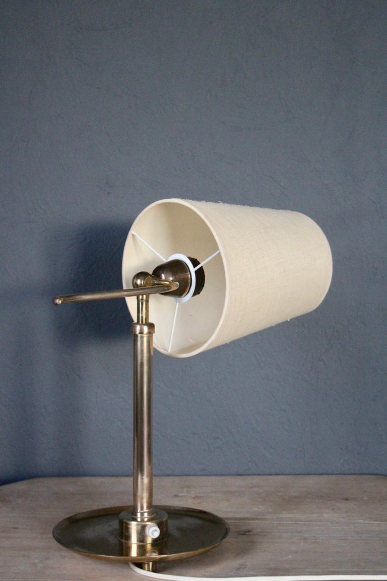 Adjustable brass table lamp For Sale at 1stDibs