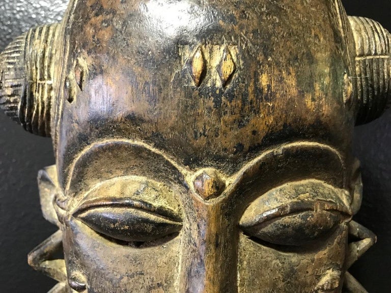 African Baule Tribe Intricately Carved Wood Fertility Mask at 1stDibs