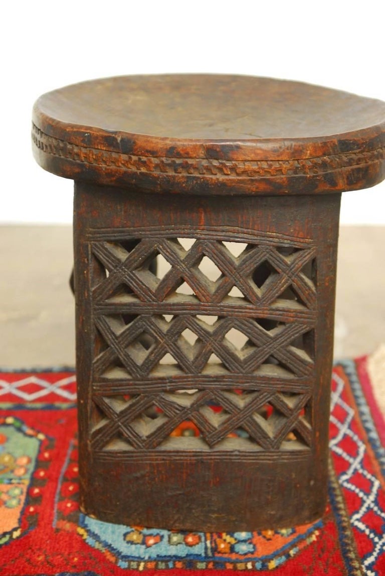African Carved Tribal Stool with Figural Legs at 1stDibs