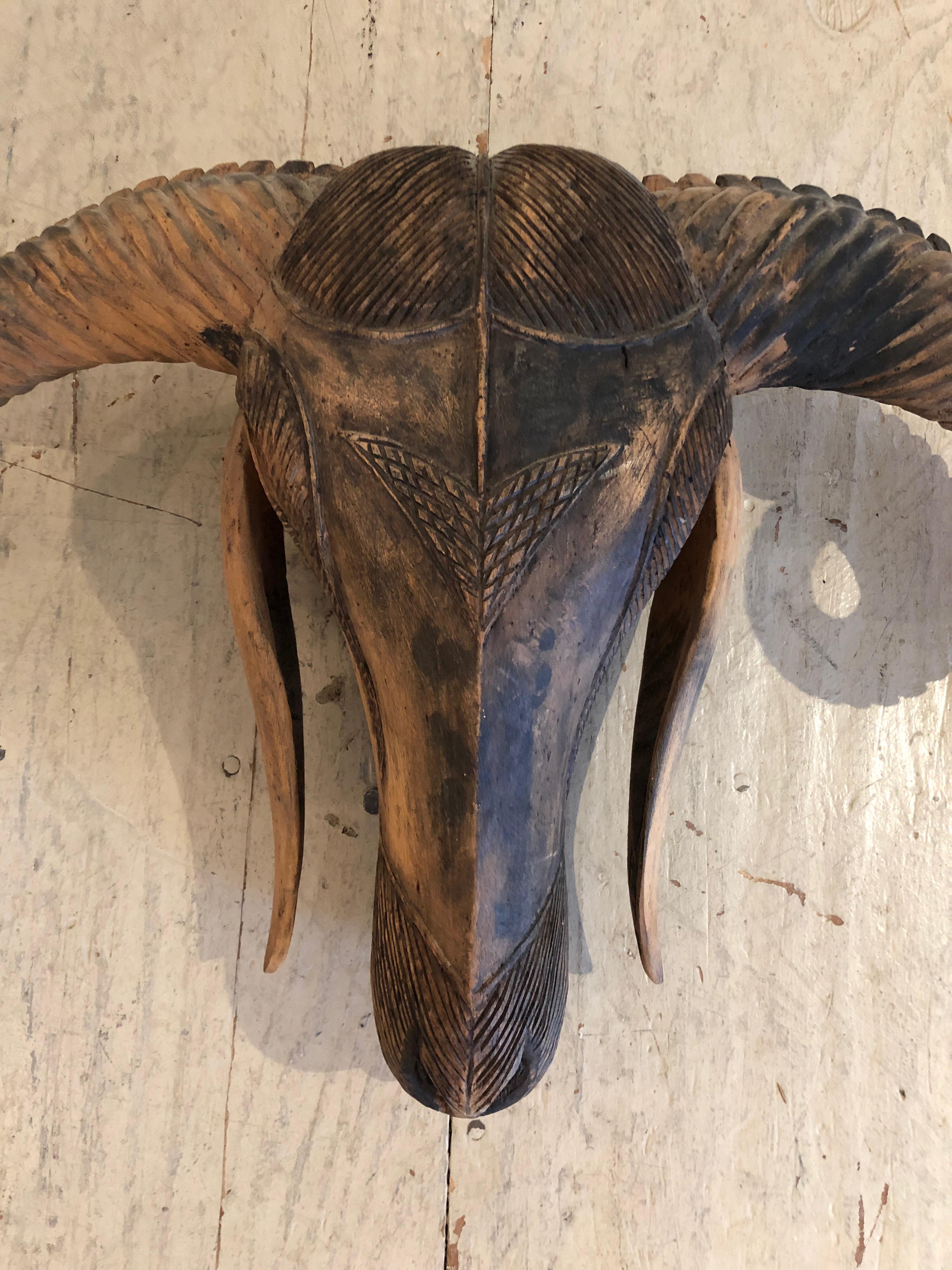 African Carved Wood Ram's Head Mask Wall Sculpture at 1stDibs