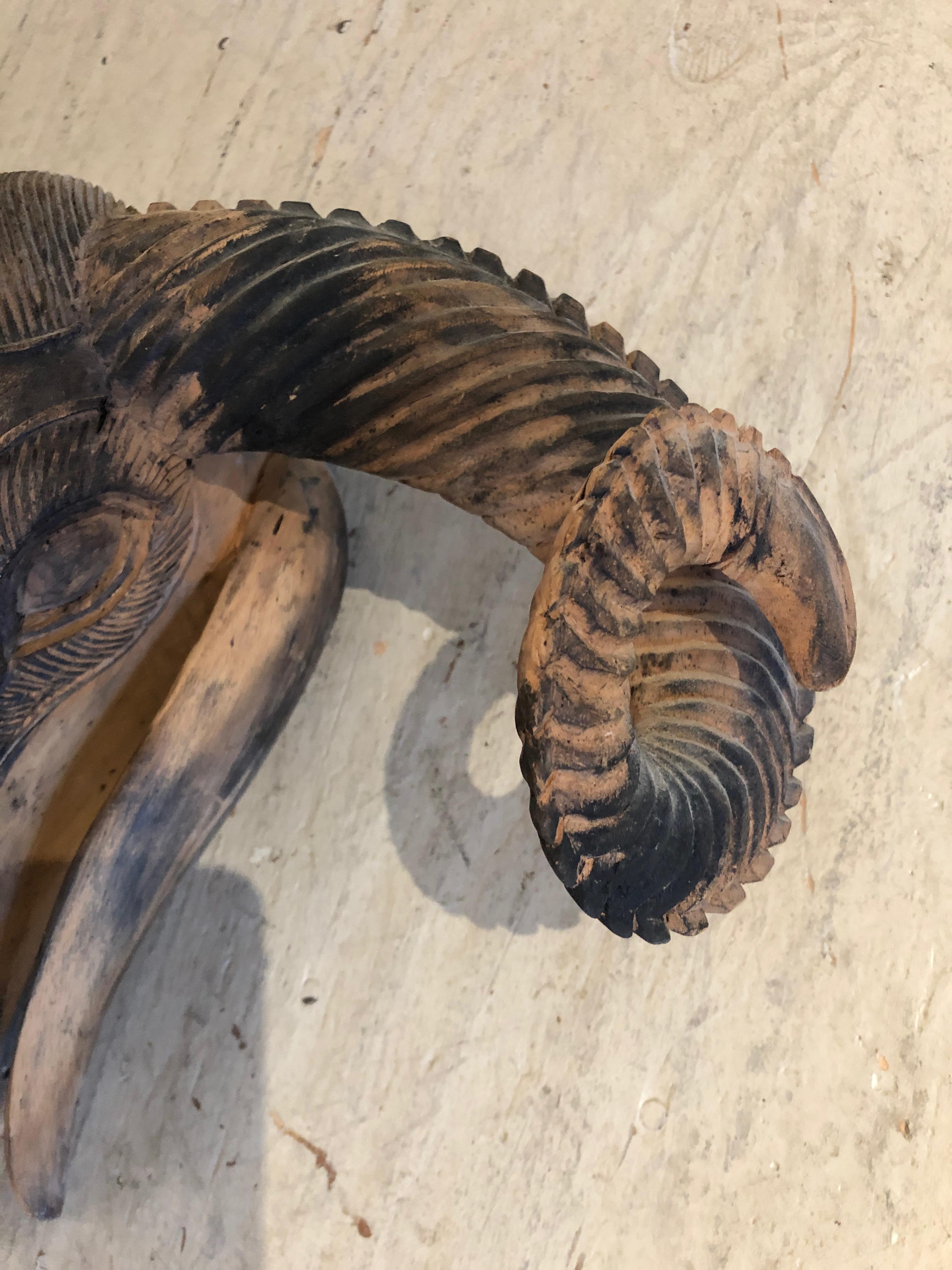 African Carved Wood Ram's Head Mask Wall Sculpture at 1stDibs