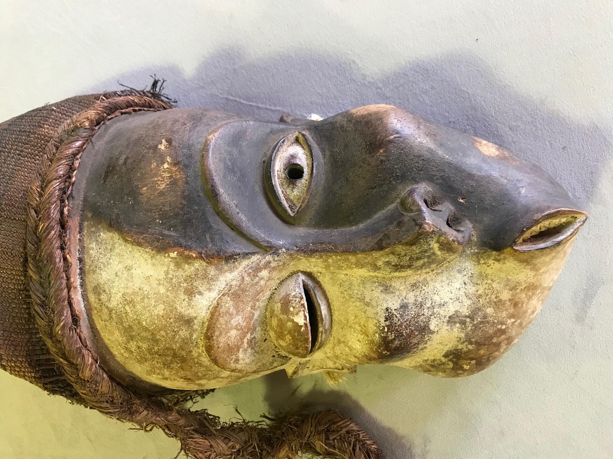 African Pende Tribe Mbangu Asymmetrical Carved Mask For Sale at 1stDibs